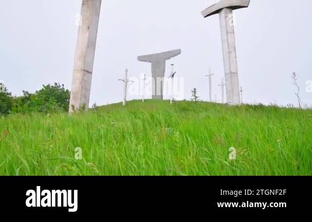 "Tilt up view symbolic steel sword statues in ground in Didgori. Famous ...