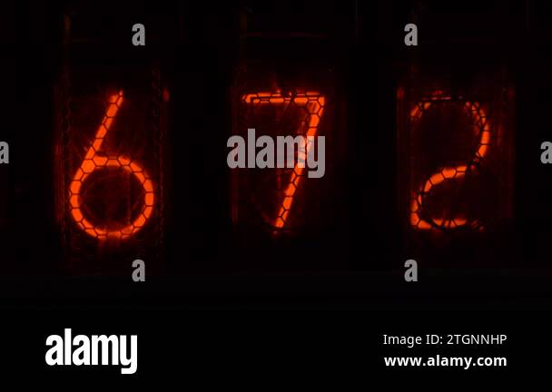 Retro vacuum tube display on the device counts seconds. Displaying ...
