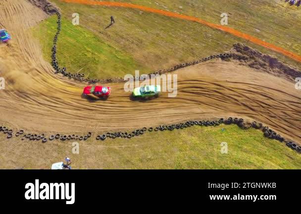 Summer dry dirt road. Sunny day. A car picks up a lot of dust at high ...