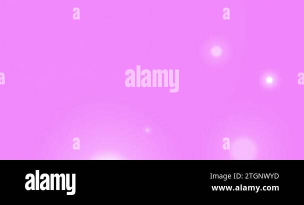Digital animation of spots of light against copy space on pink ...