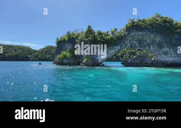 4K Beautiful footage of the seascape view with mountain cliffs covered ...