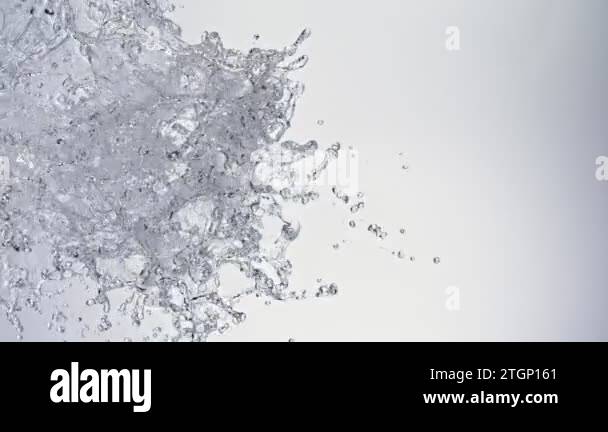 Super Slow Motion Shot of Real Side Water Splash Explosion on White ...