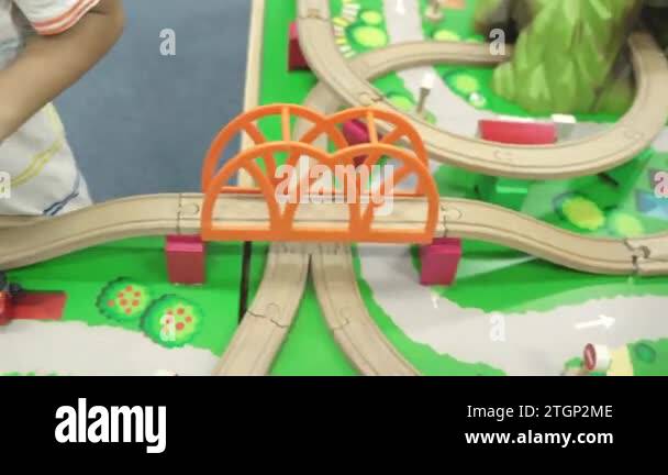 Happy Asian children having fun on entertainment center inflatable ...