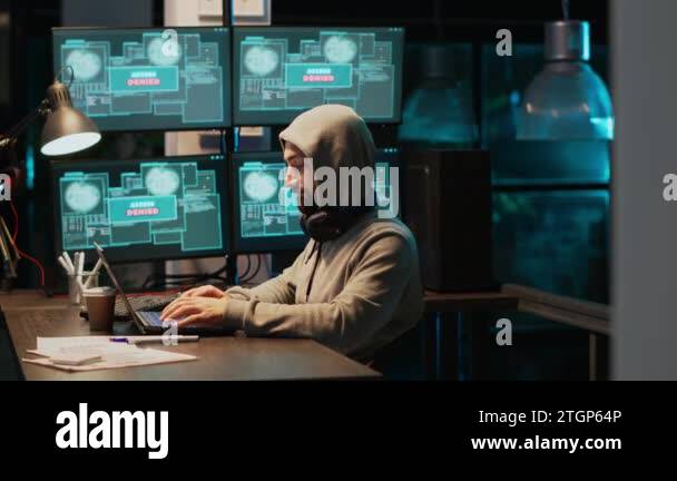 Young scammer trying to break database network, using virus to activate malware and steal IT ...