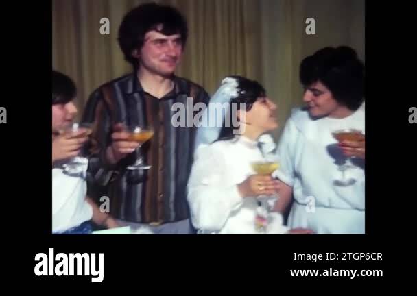 palermo, italy may 1980: People eat and converse to celebrate a young ...
