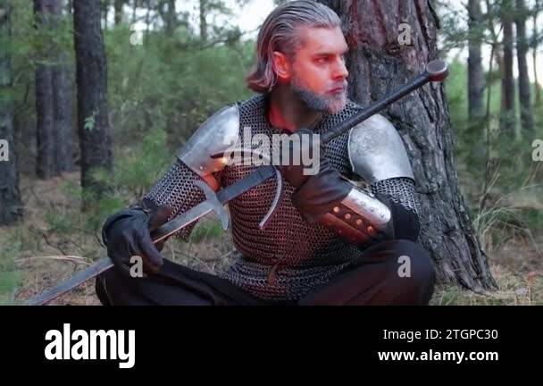 Portrait of a medieval warrior with gray hair and a scar on his face in ...