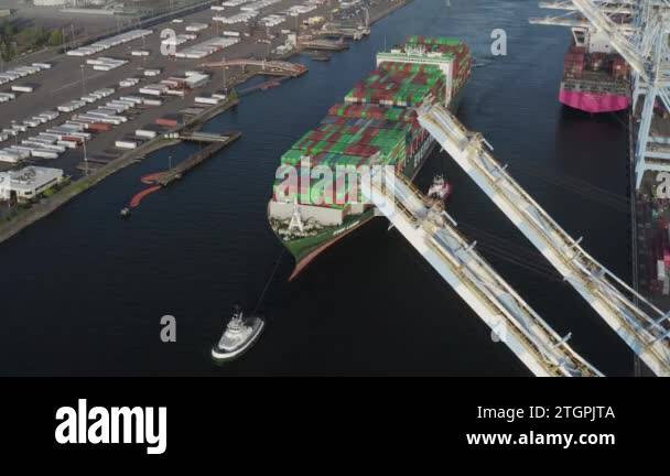 Tugboats And Cargo Ship Fully Loaded With Intermodal Containers For ...