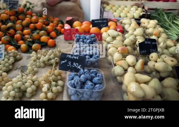 Fruits and vegetables on the counter at the street market. Place Saleya ...