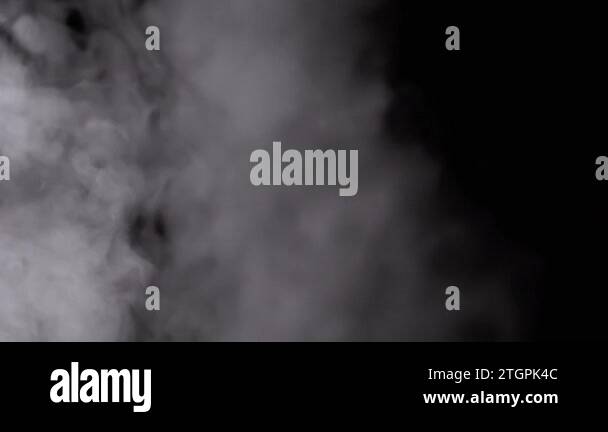 Explosion of a White Foggy Cloud of Flying Smoke on Black Background ...