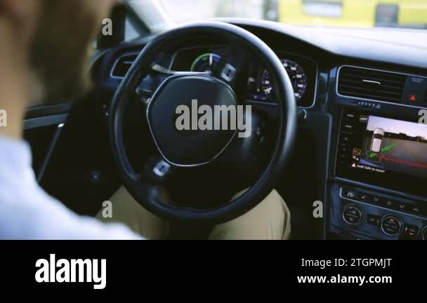 Vehicle parallel parking by itself in suburban town street. Self ...