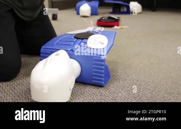 Security guard training for CPR first aid with the AED Stock Video ...