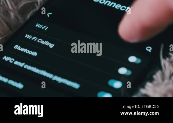 Turning on and off Wi-Fi on a smartphone. The wifi button is turned on ...