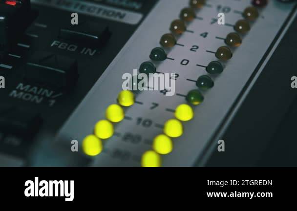 LED indicator of sound level signal on the mixing console. LED strip in ...