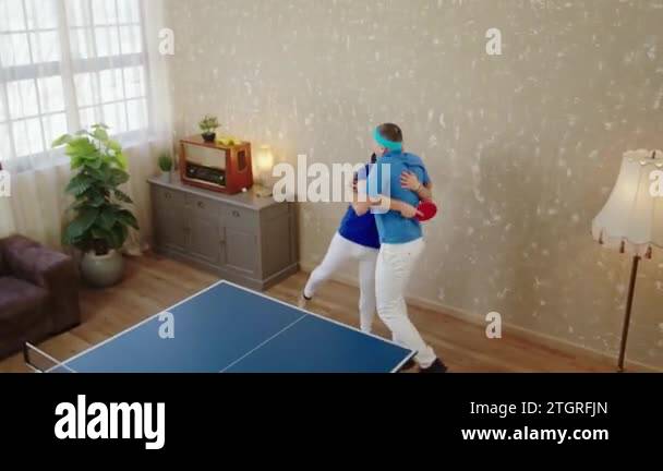 Charismatic old man and young guy happy and excited dancing and enjoy ...