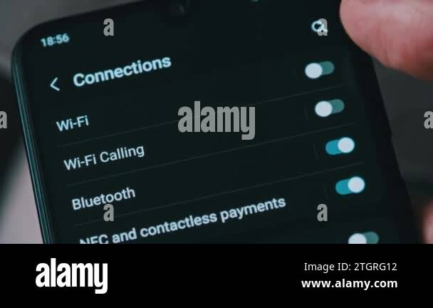 Turning on and off Wi-Fi on a smartphone. The wifi button is turned on ...