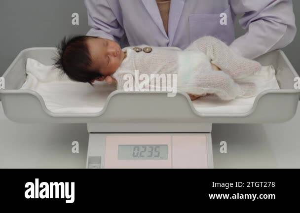 Baby scales hospital Stock Videos & Footage - HD and 4K Video Clips - Alamy