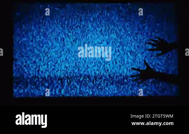 Hands on the background of the noise of the TV scary scene for a horror ...