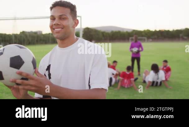 Video of biracial player with diverse group of male football player on ...
