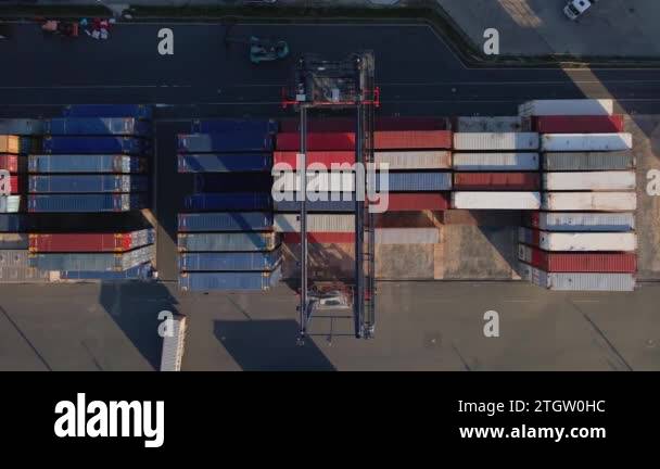 Shipping container site in warehouse storage factory, aerial view ...
