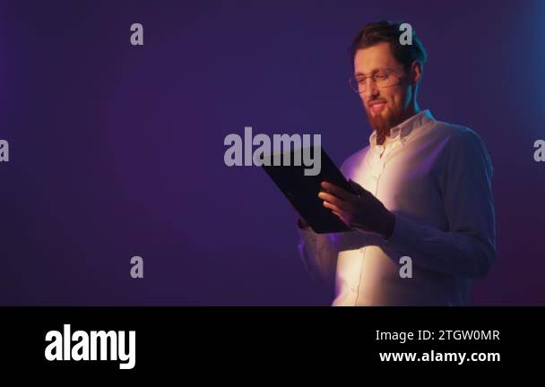 Digital life. Searching man. Neon light portrait. Smiling smart casual ...