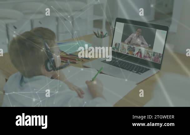 Animation of network of connections over caucasian boy using laptop for ...