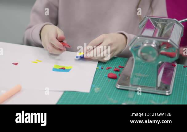Female hands rolling polymer Stock Videos & Footage - HD and 4K Video ...