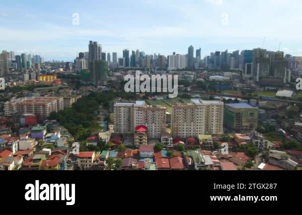 An aerial of crowded residential buildings in the center of Manila ...