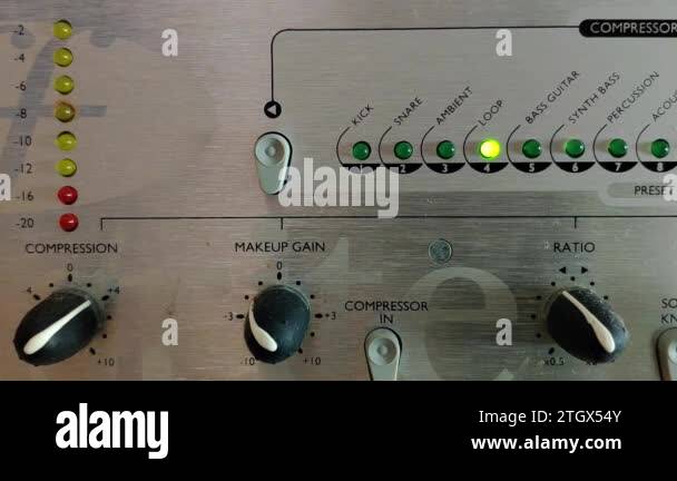 An audio device with knobs and horizontal LEDs. As a button is pressed ...