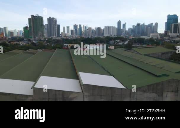 An aerial view through buildings revealing downtown modern skyscrapers ...