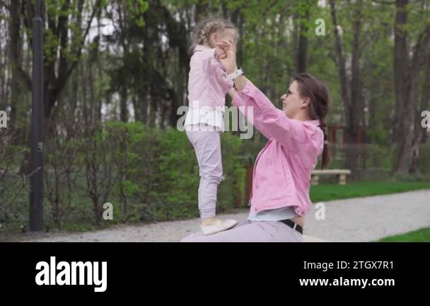 A four-year-old flaps her arms like a bird flaps its wings. Learning to ...