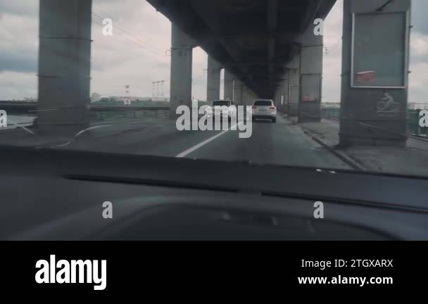 Windshield of the car, with a crack. Automobile traffic on the roads of ...