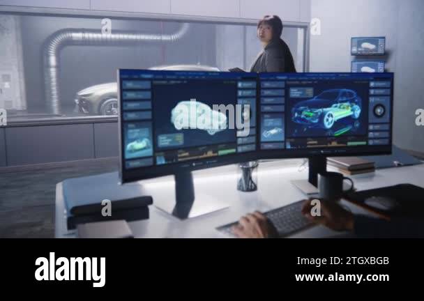 Engineers check aerodynamics of eco-friendly electric car in lab for ...