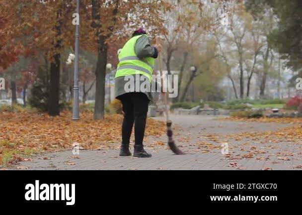 Female street sweeper Stock Videos & Footage - HD and 4K Video Clips ...