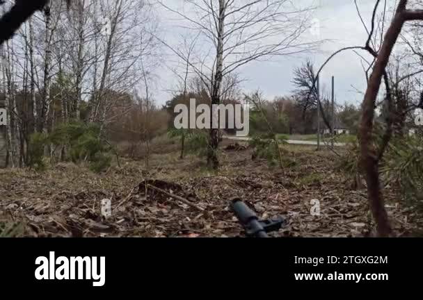 Ambush in forest with Kalashnikov assault rifle. Position defense. Wars ...