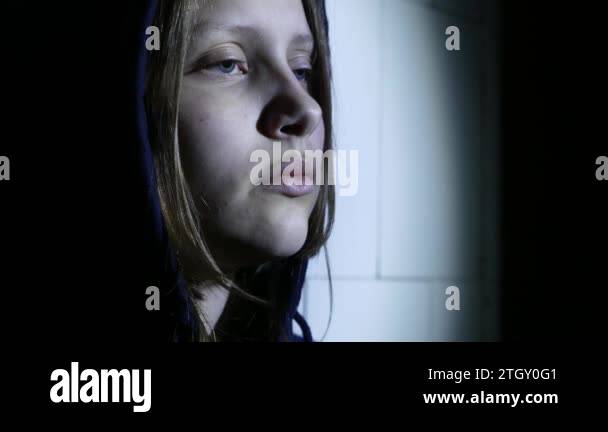 Teen girl. Drug addiction. Depressed face of a teen girl with overdose ...