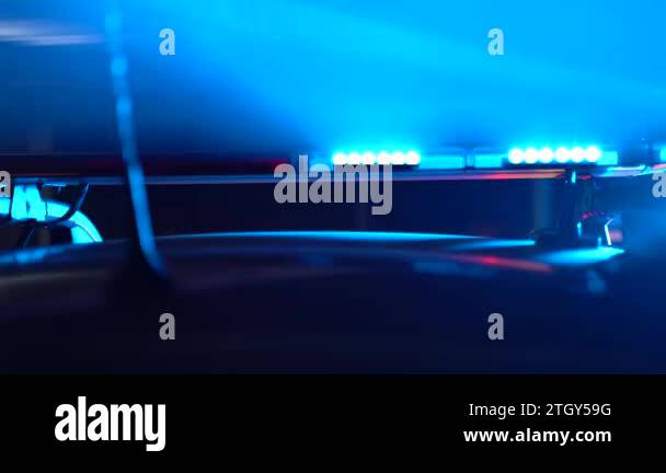 Red blue warning lights on a police car. Slow motion Stock Video ...