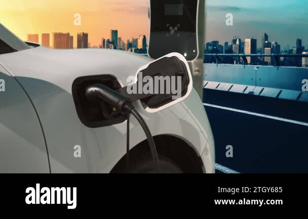 Electric vehicle, EV car recharges battery energy at charging station ...