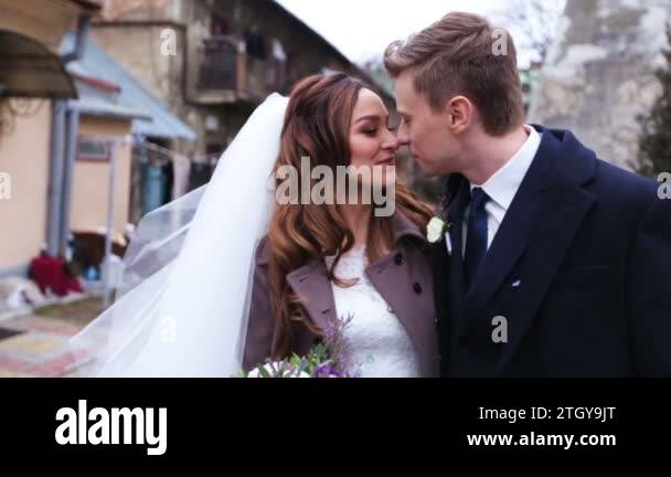 Beautiful young couple just entered from the church where they ...