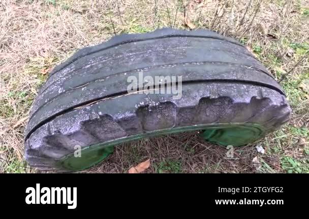 old tires. wheels are dug into the ground. painted tires. Old Retro Kid ...