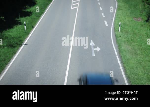 Rush hour traffic on multiple highway road. Cars moving fast on modern ...