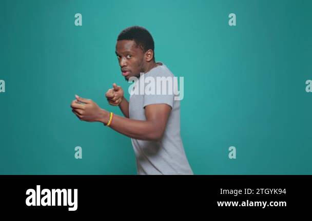 Young person shooting gun Stock Videos & Footage - HD and 4K Video ...