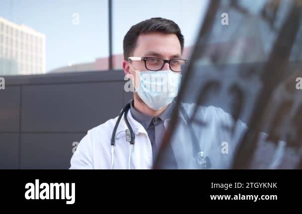 Doctor examines CT scan of chest and abdomen. X-ray or mri for the ...