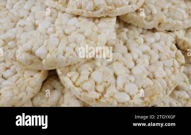 Puffed rice cakes. White rice wafer in close up Stock Video Footage - Alamy