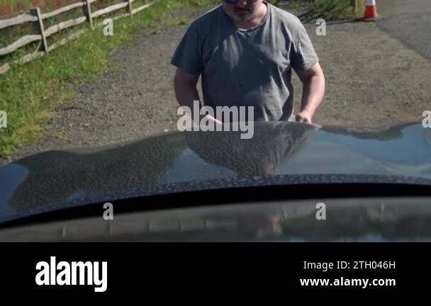 Frustrated Man Repairing Accident Car. Sad Disappointed Male On Broken ...