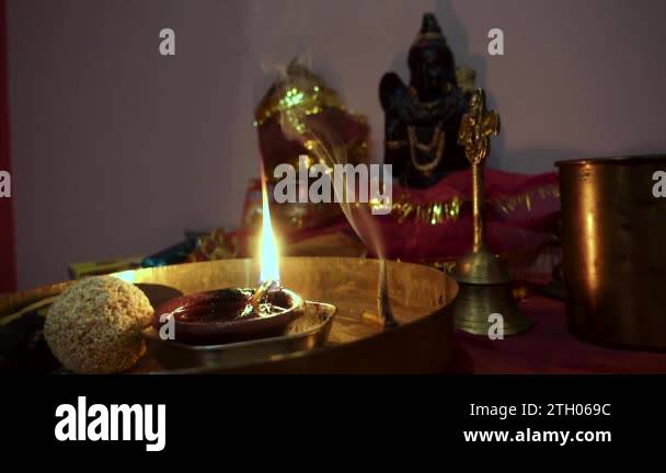 A close up shot of SHIVA prayer and ritual during MAHASHIV RATRI ...