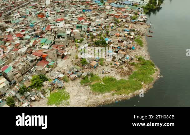 Poor district and slums in Manila with shacks and buildings. Manila ...