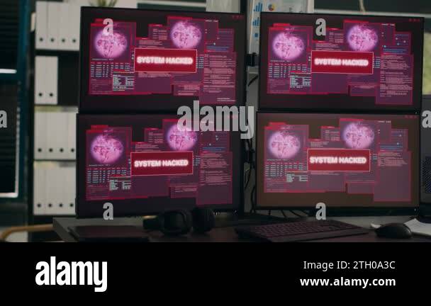 Multiple monitors displaying hacking warning alert after security ... Multiple monitors displaying hacking warning alert after security ...