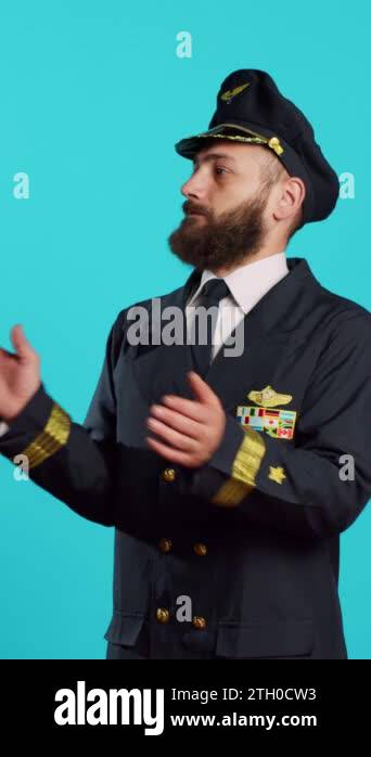 Vertical video: Male aviator applauding and cheering on camera, saying ...