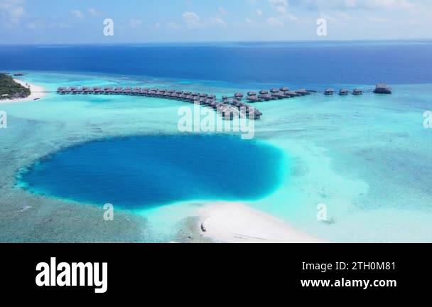 Oceanic trench among coral reefs in The Maldives, Indian Ocean. Drone ...