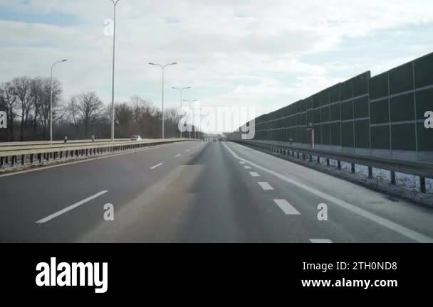 A frame seen by a driver driving on the expressway. Two lanes of road ...